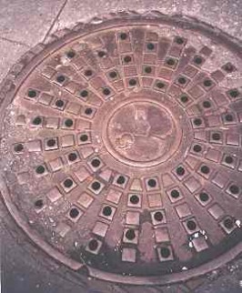MANHOLE AND COAL CHUTE COVERS - Forgotten New York